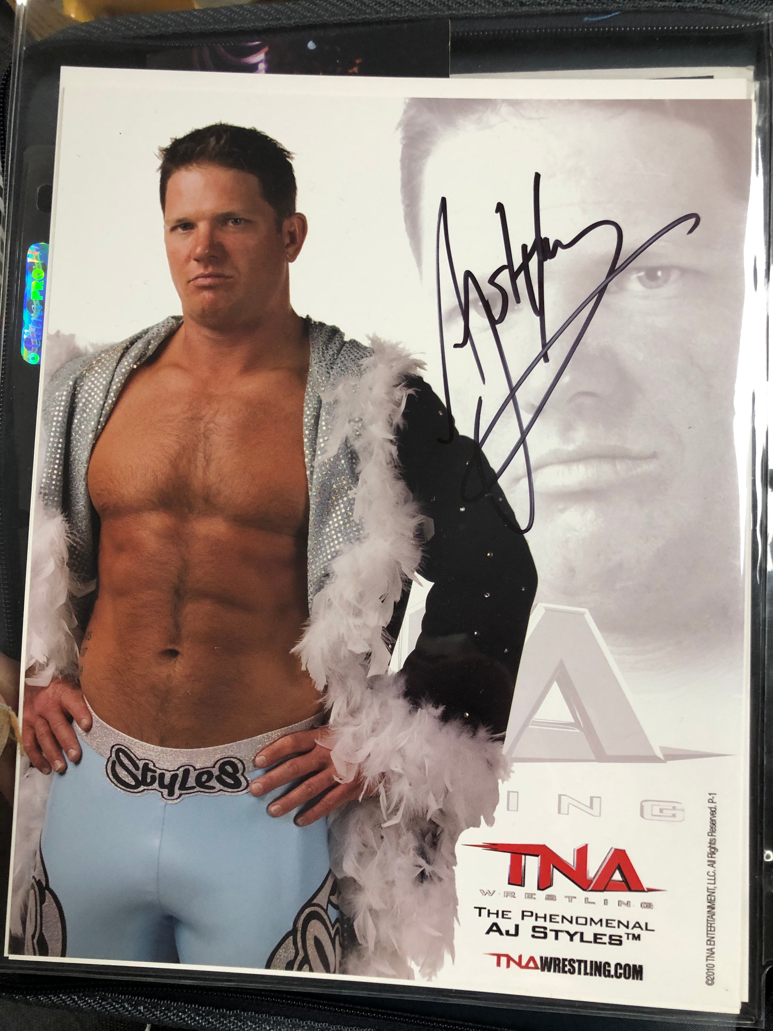 AJ STYLES - Signed TNA Promo 8x10 – Leeloo Multiprops, LLC